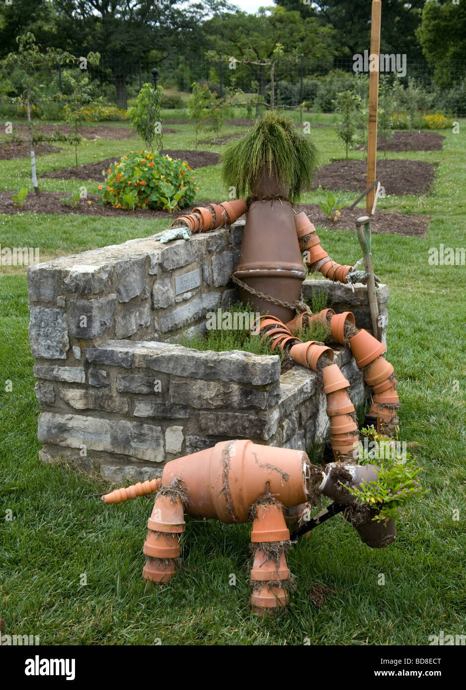 Scarecrow and family dog Stock Photo - Alamy