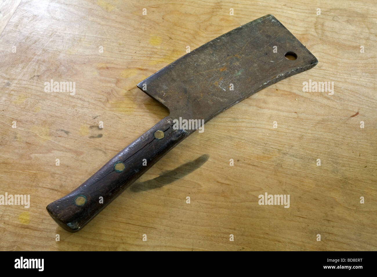 Old, heavily used kitchen cleaver Stock Photo - Alamy