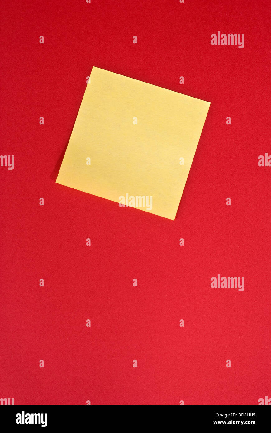post it on red background, office supplies Stock Photo - Alamy