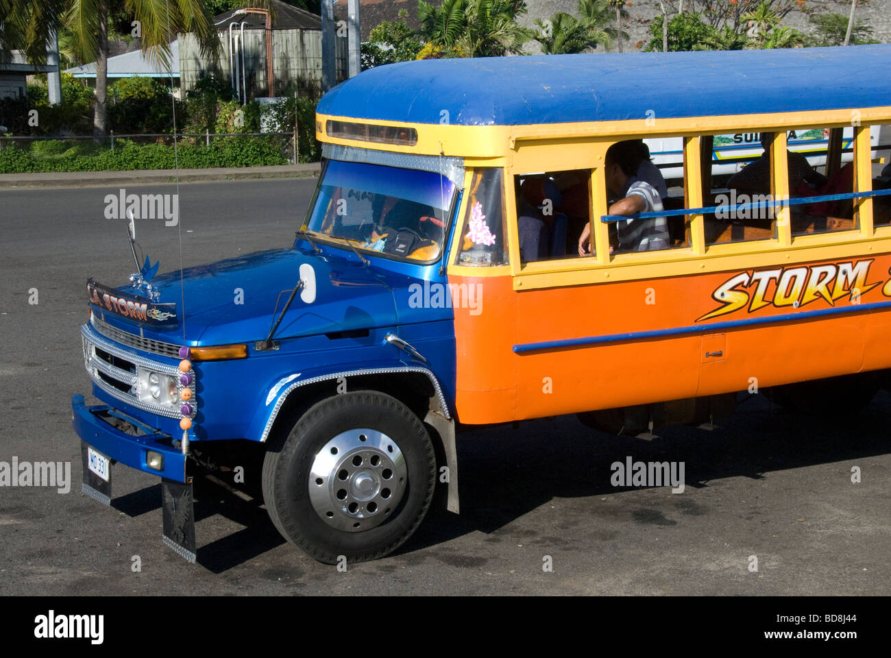 Brightly coloured bus in Apia, Western Samoa Stock Photo - Alamy