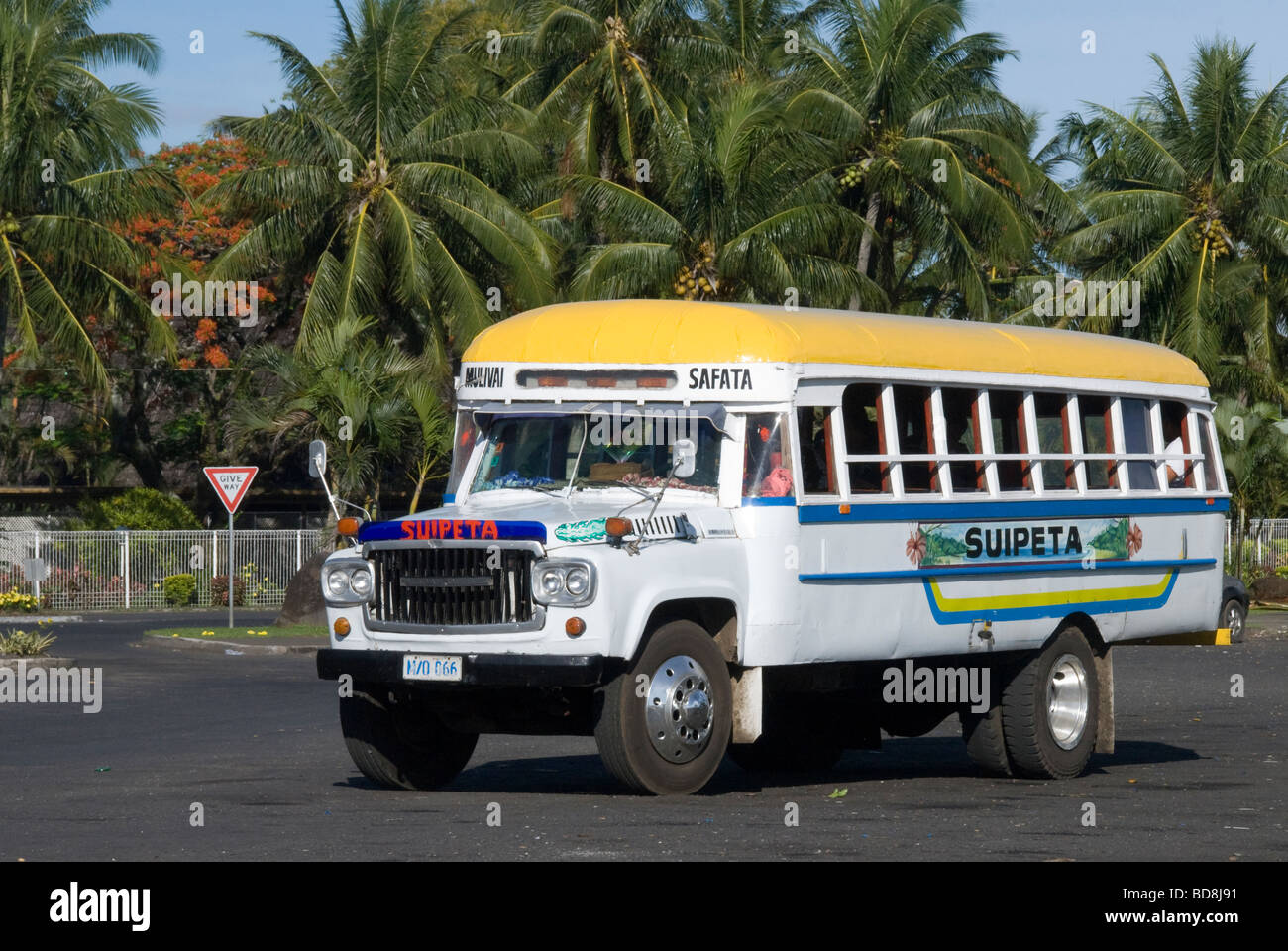 Brightly coloured bus in Apia, Western Samoa Stock Photo - Alamy