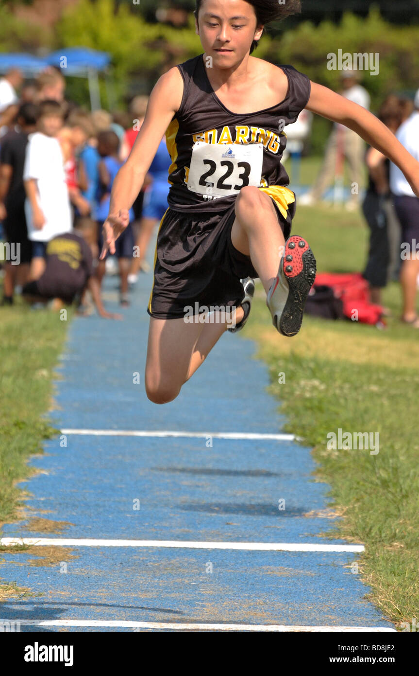 Male long jump competitors in the Track and Field event during the ...