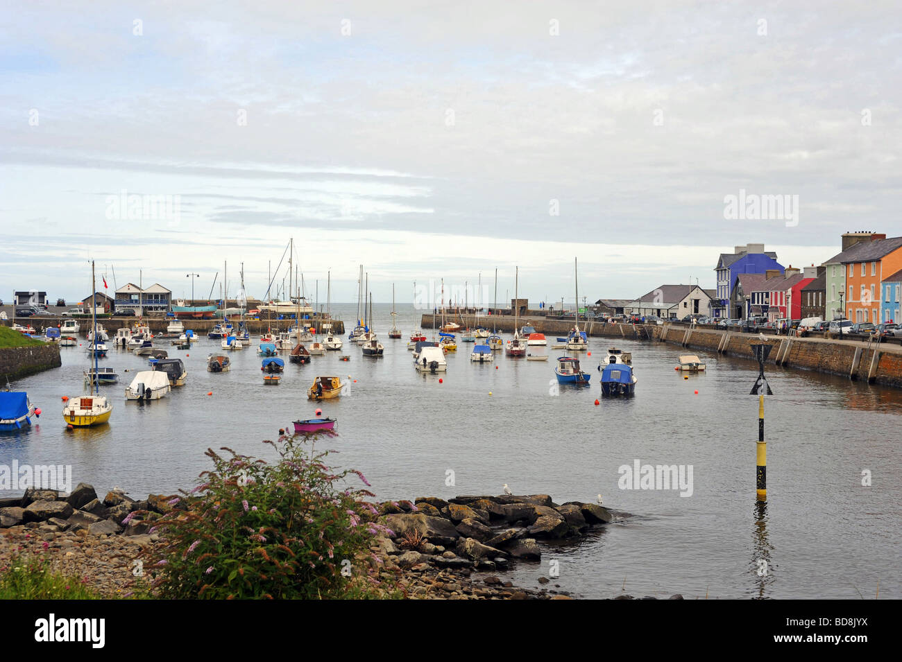 Aberaeron Harbour at high water from a wooden bridge looking west out ...