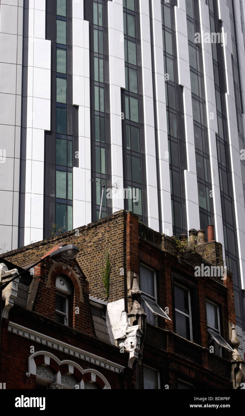 Modern Building Behind Old Building High Resolution Stock Photography ...