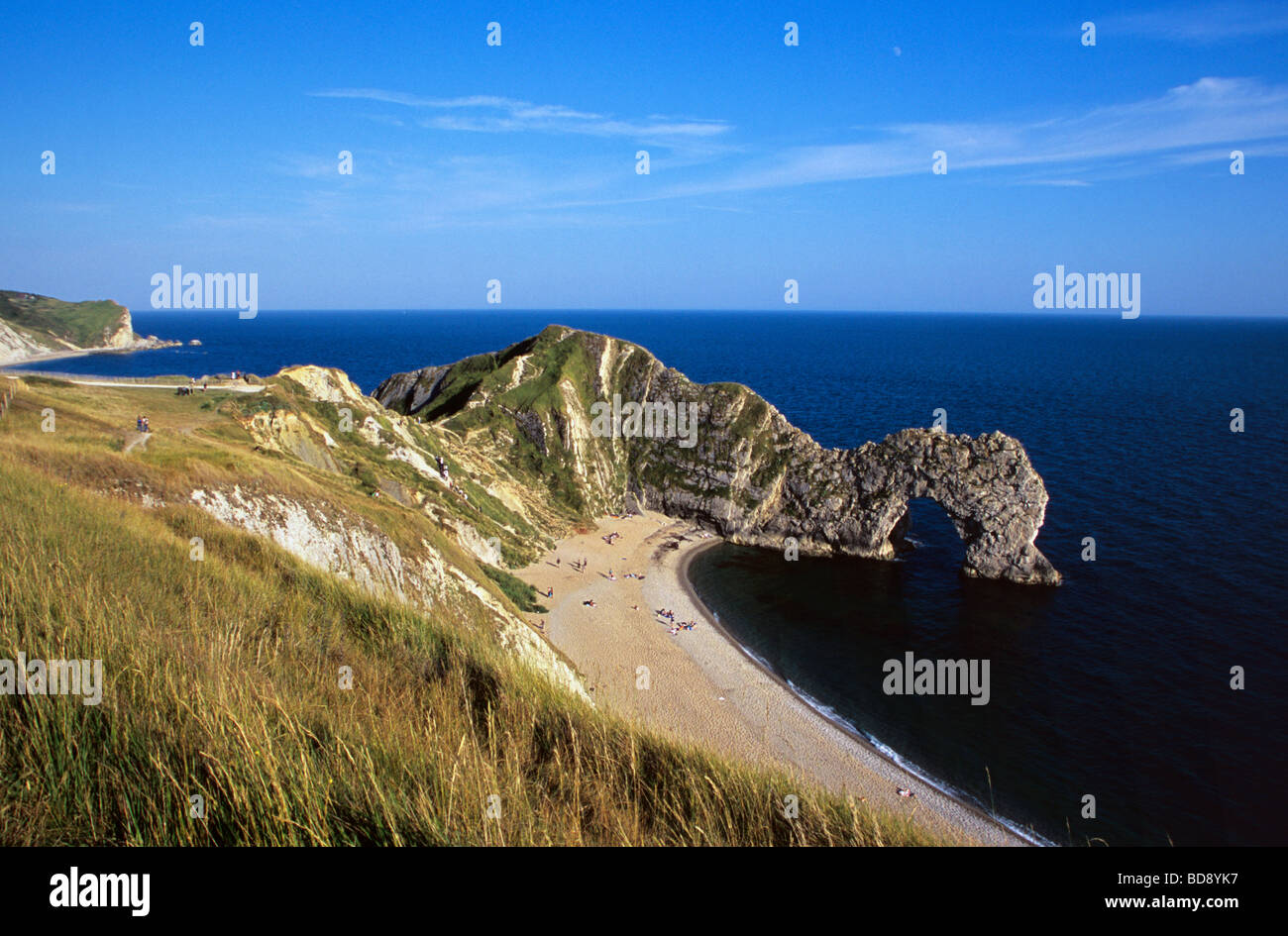 View of the natural rock arch of Durdle door near Lulworth Cove, on ...