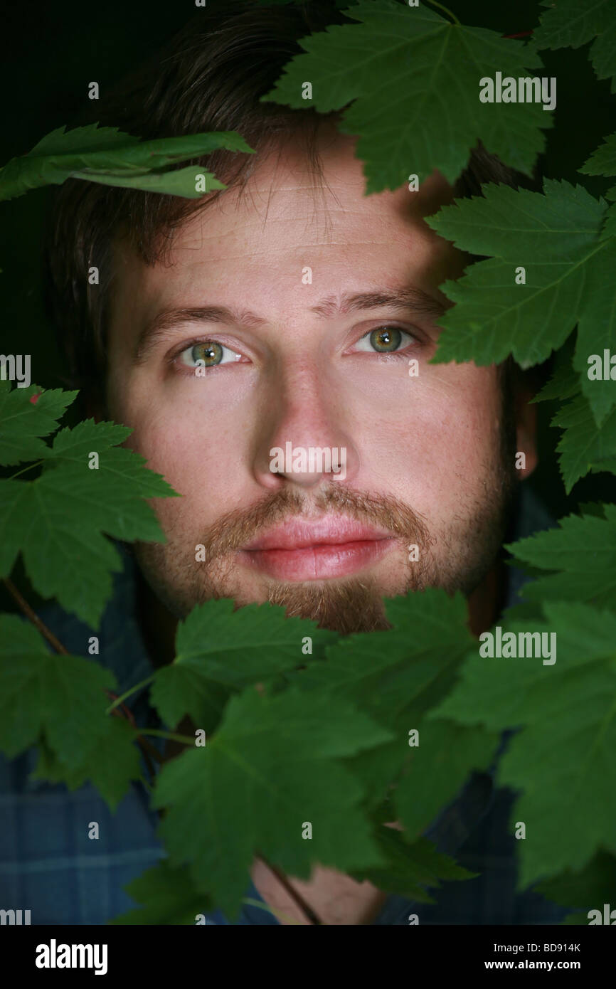 Face surrounded by leaves hi-res stock photography and images - Alamy