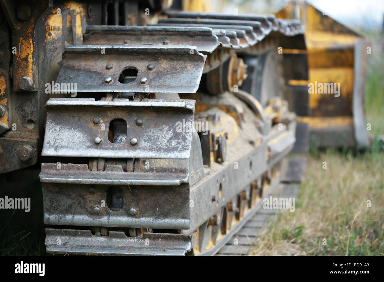 The tracks of a bull dozer excavating machine Stock Photo - Alamy