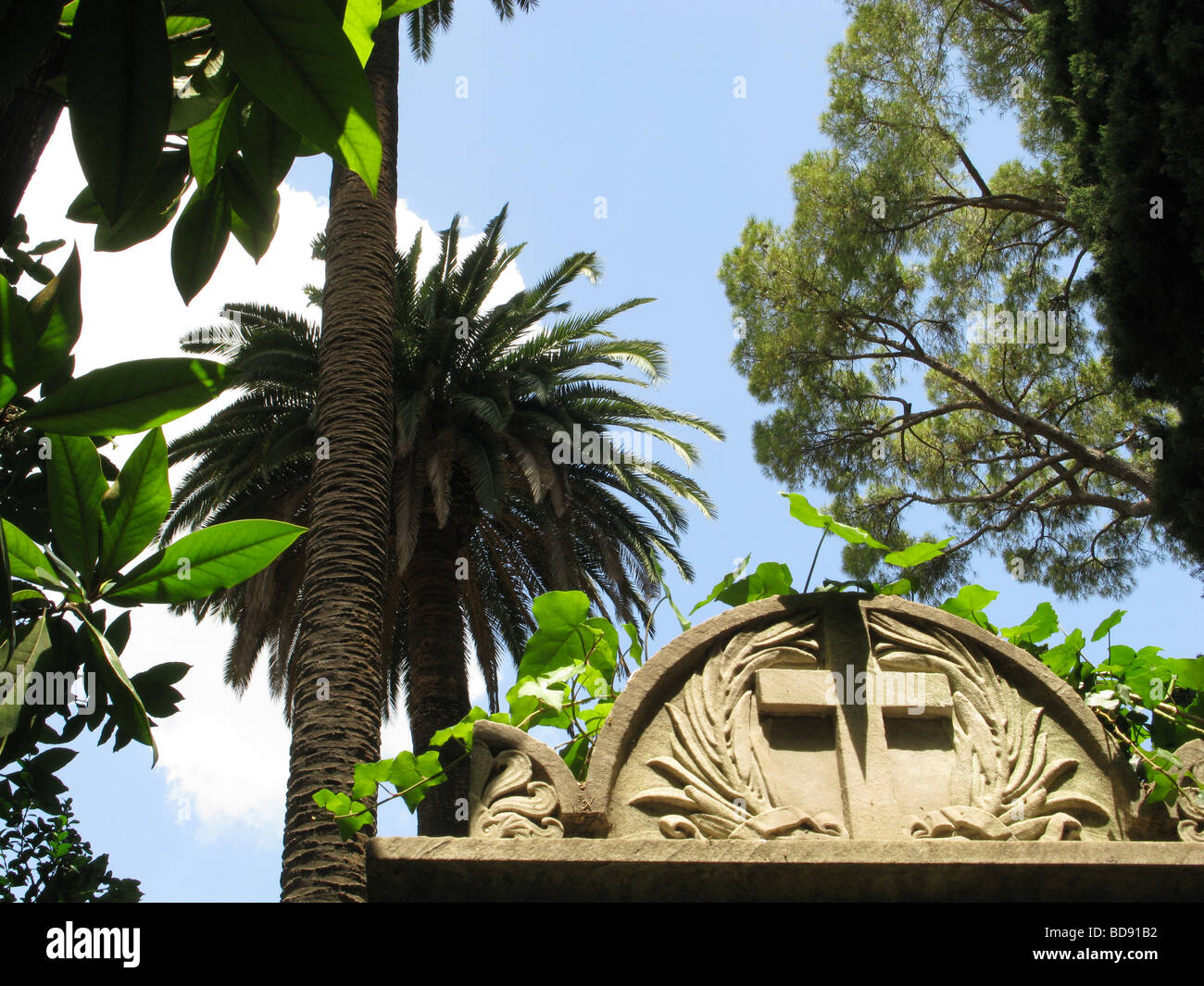 Old cross gravestone in protestant cemetery hi-res stock photography ...