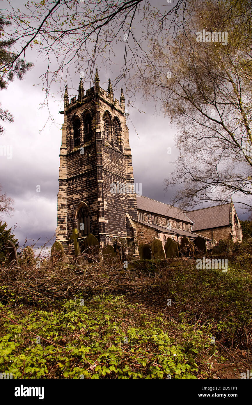 St. Mary's church at Lymm dam in Cheshire on a stormy British day Stock ...