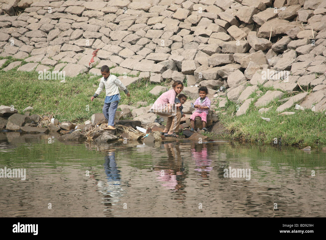 Children playing on river bank hi-res stock photography and images - Alamy