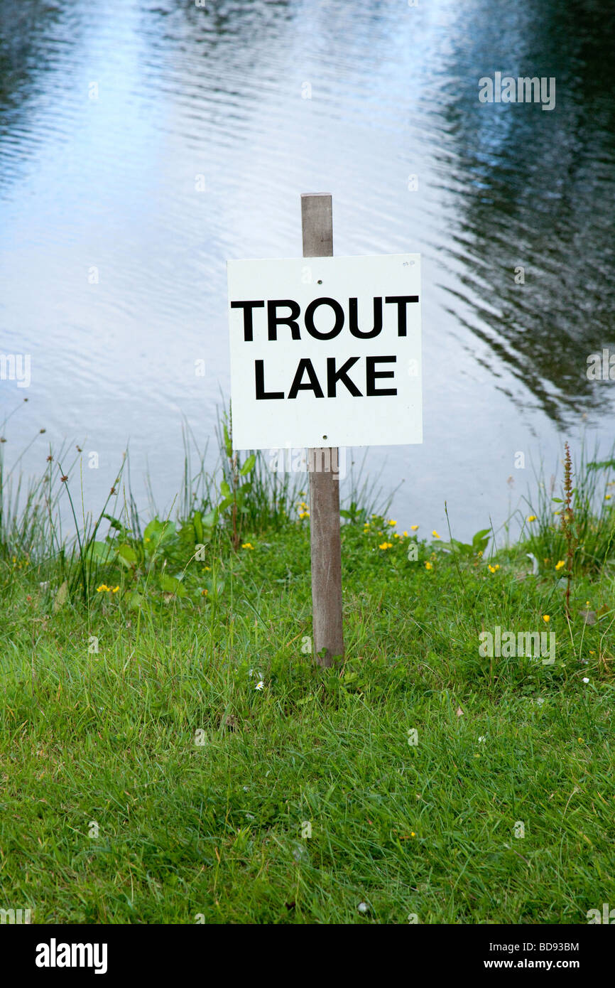 Trout lake sign Hatchlands fishery Devon England Stock Photo - Alamy