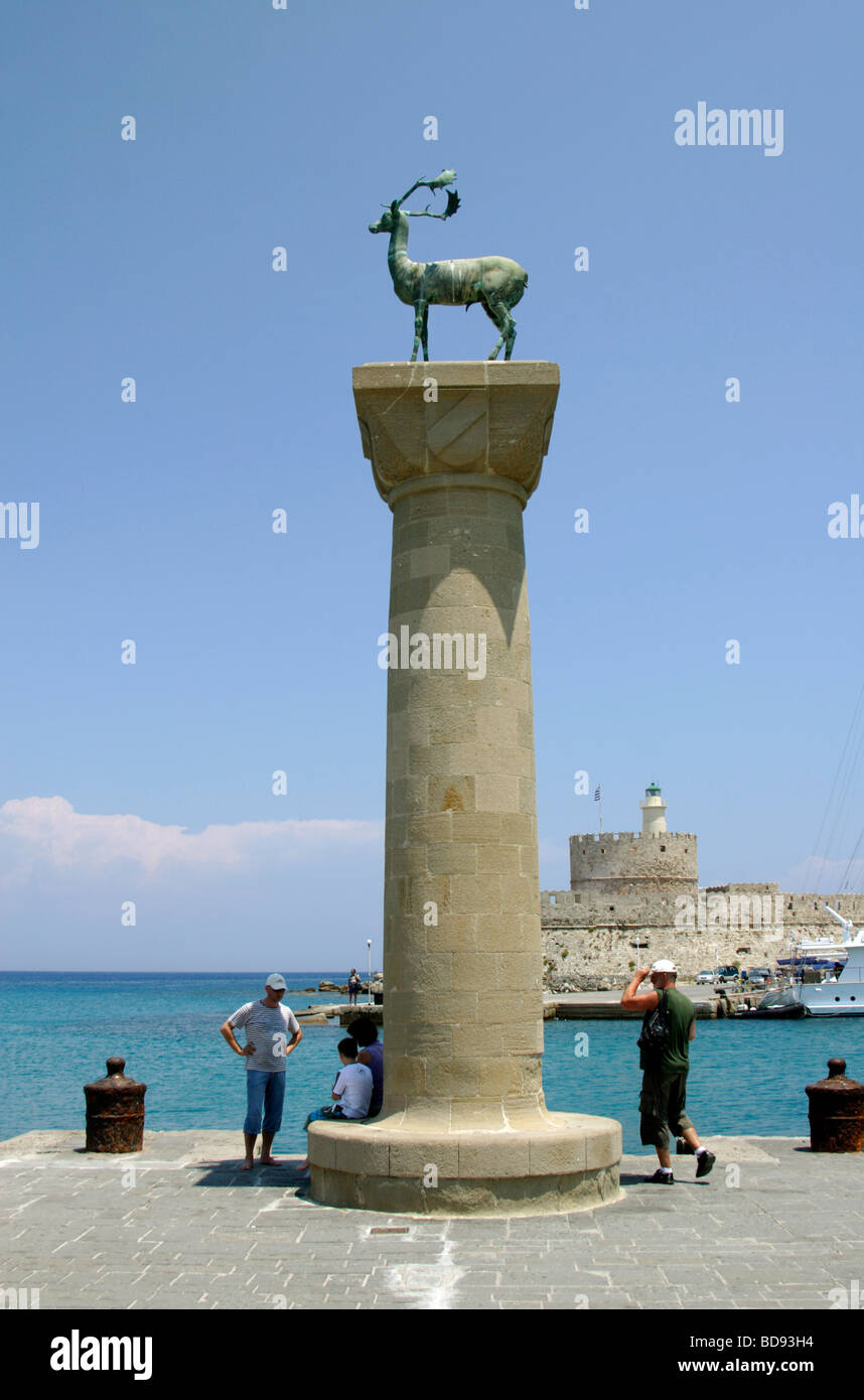 Stag column and Agios Nikolaos lighthouse at Mandraki Harbour Rhodes ...