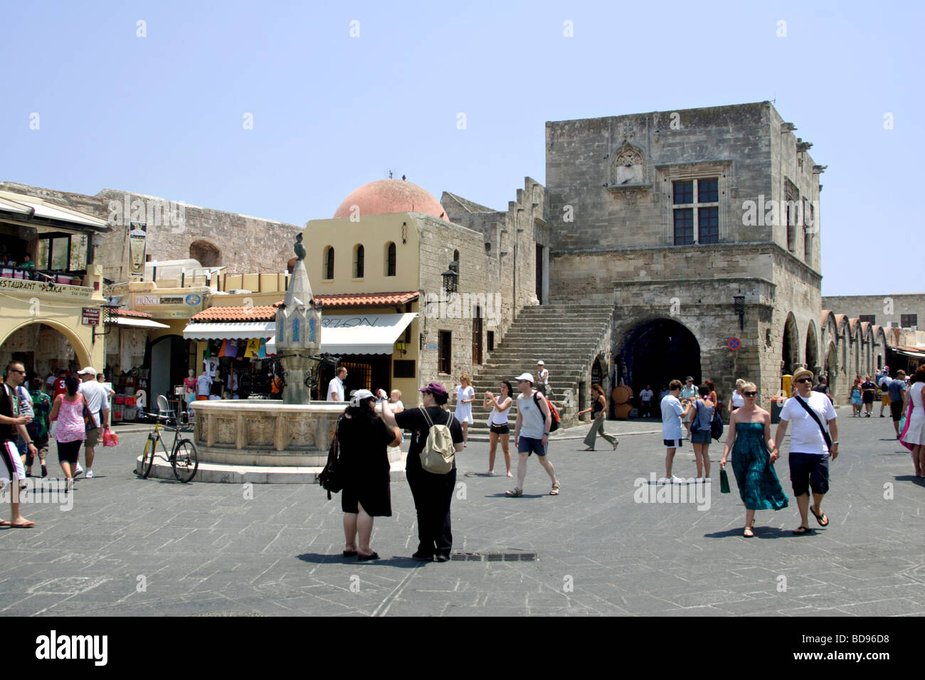 Tourists in Hippocrates square Rhodes Old Town Rhodes Dodecanese Greece ...