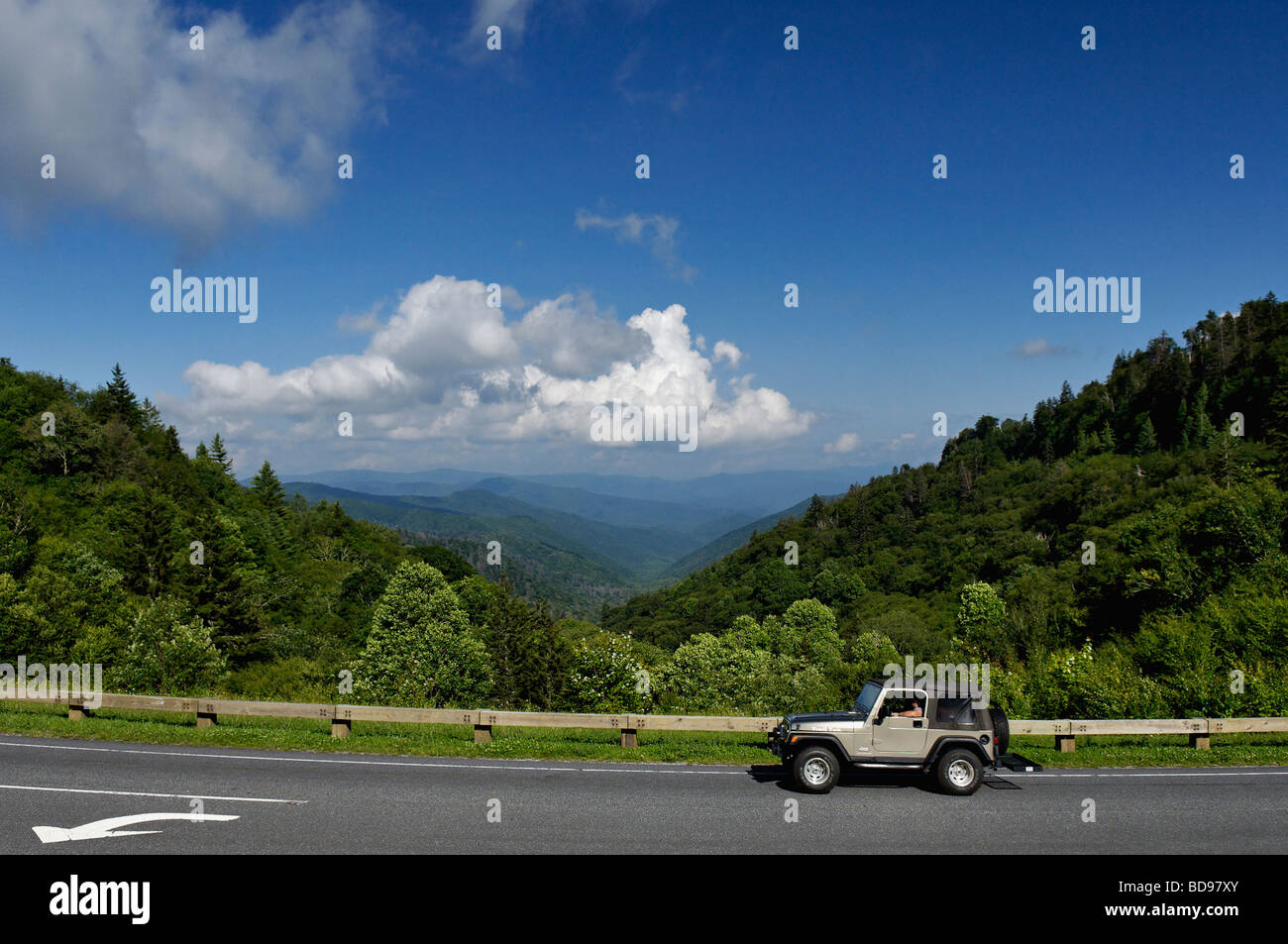 Jeep Driving Past View of the Great Smoky Mountains below Newfound Gap ...