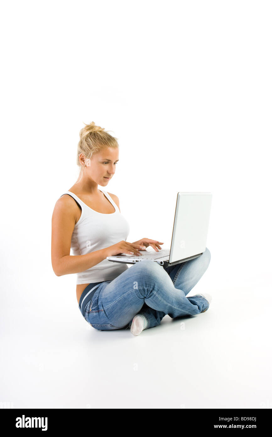 Blonde girl working on computer isolated on white background Stock ...