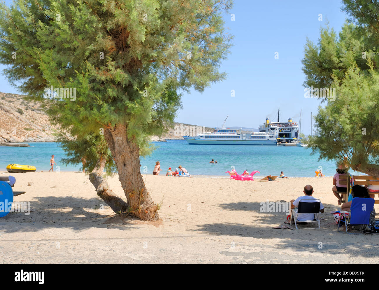 A fine view to the sandy Town Beach with shady trees of the small ...