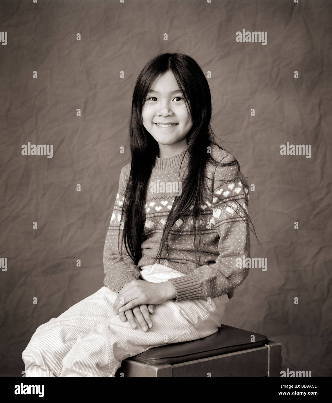 Black white studio portrait of Inuit girl in a photography studio in ...