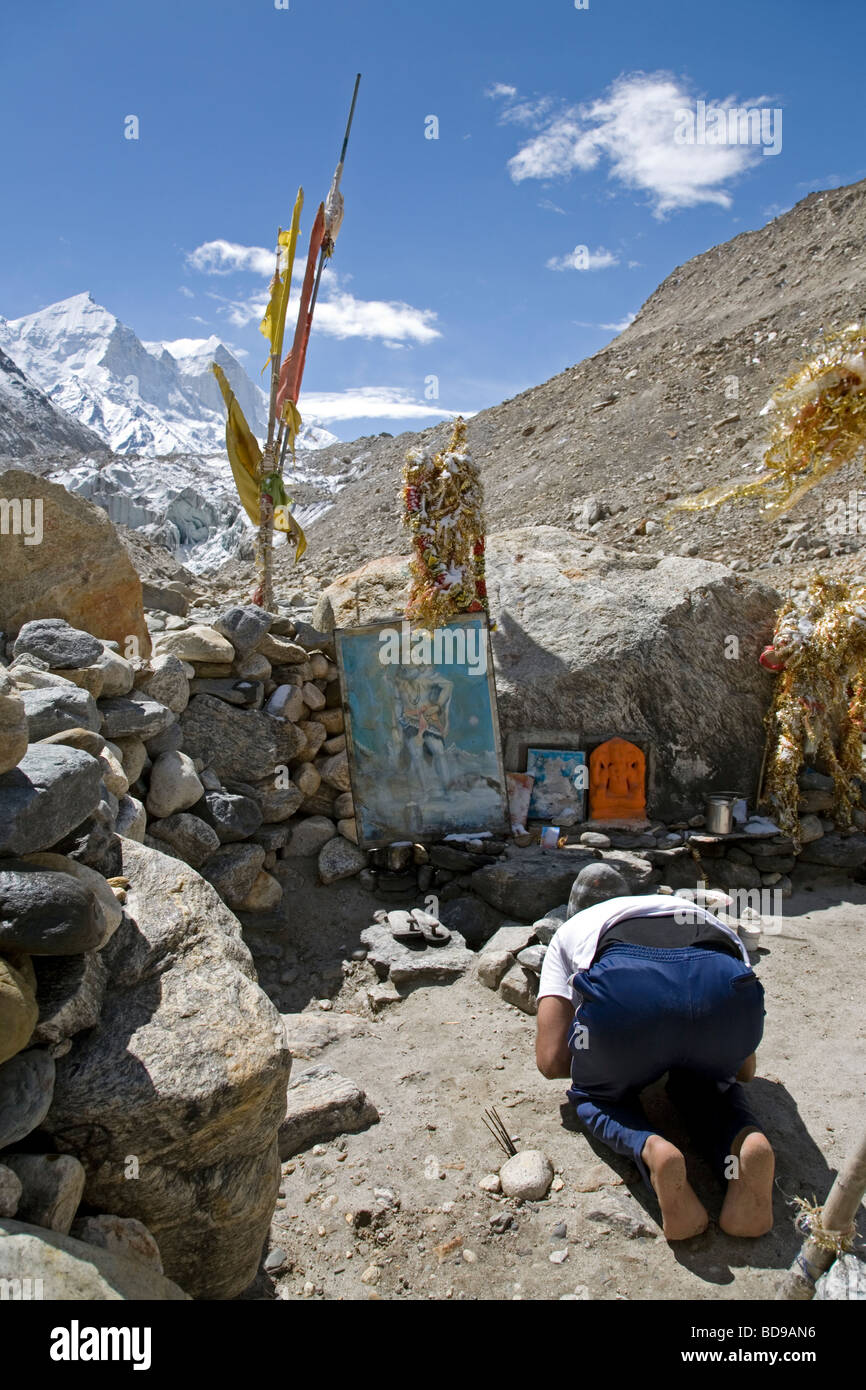 Indian man prostrating. Shiva shrine. Gaumukh Glacier.(the source of ...