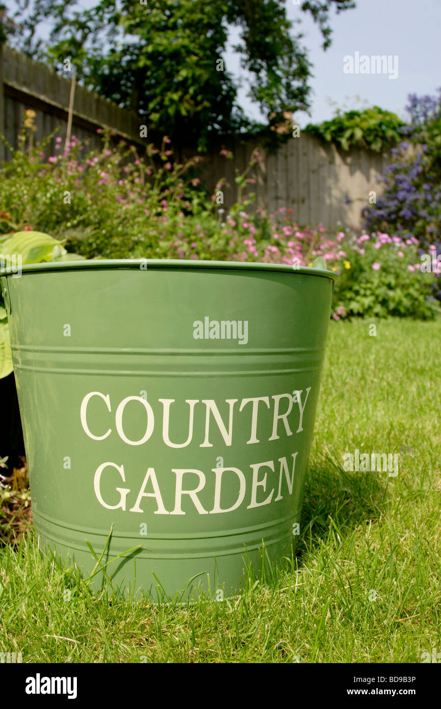 Bucket in garden , England UK Stock Photo - Alamy