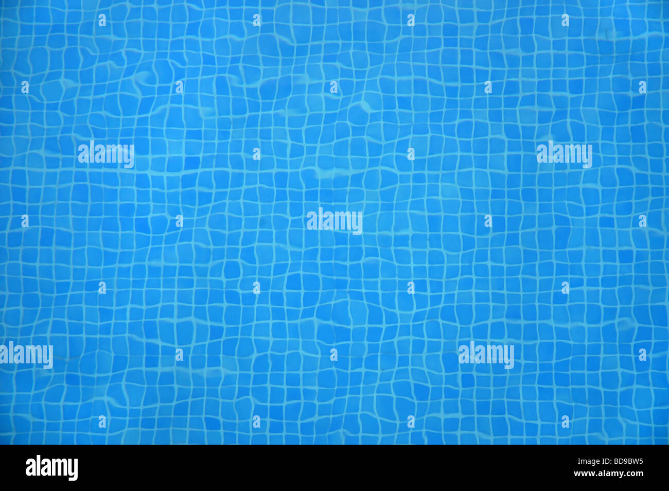 blue mosaic tiles at the bottom of a swimming pool Stock Photo - Alamy