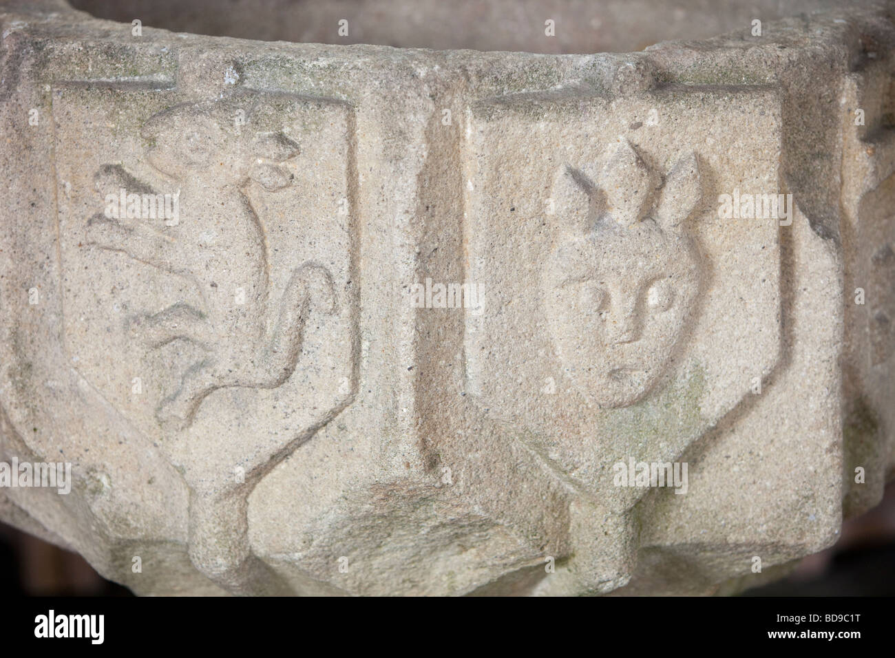 A 16th Century carved font in The Church of St Saviour the holy house ...