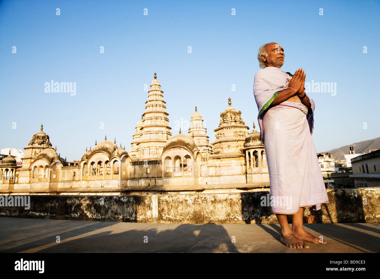 Praying in a temple hi-res stock photography and images - Alamy