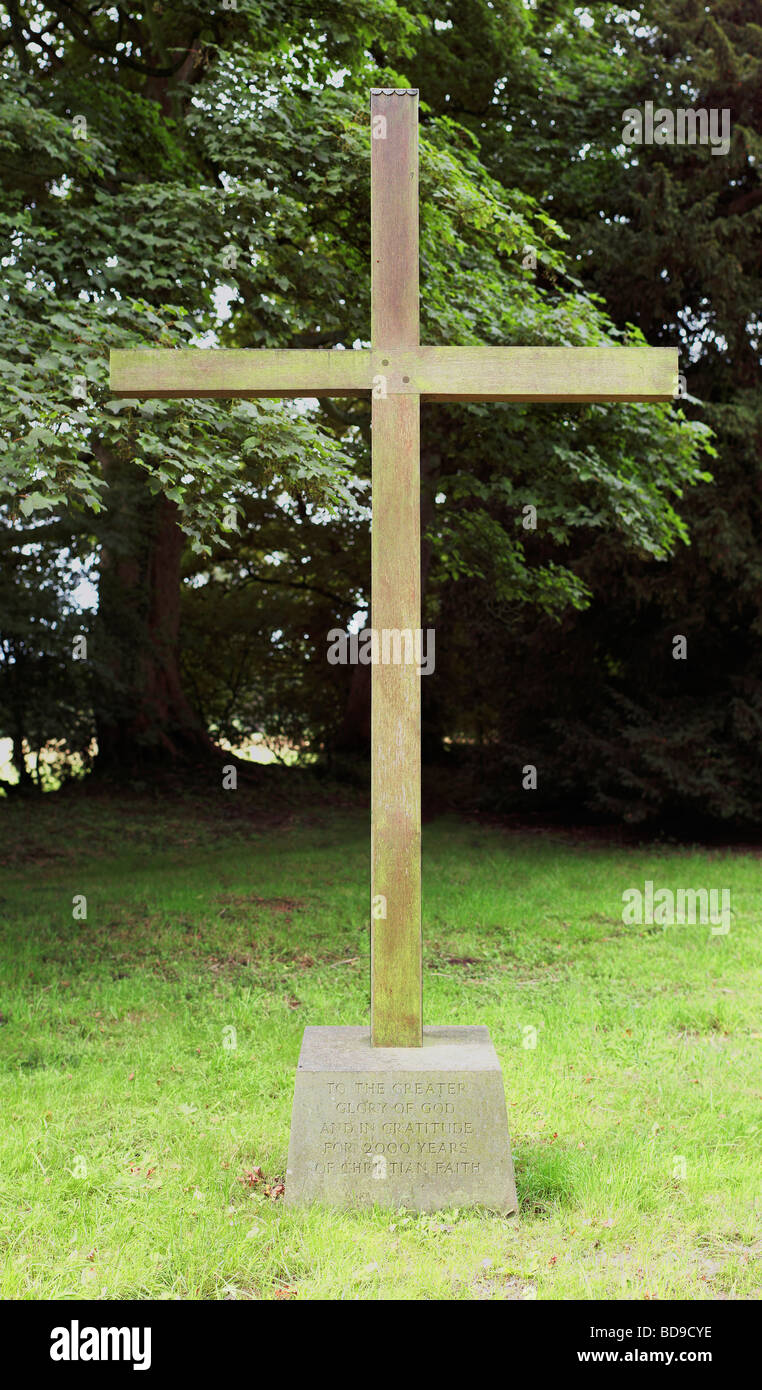 A wooden cross in a churchyard church church of england Stock Photo - Alamy