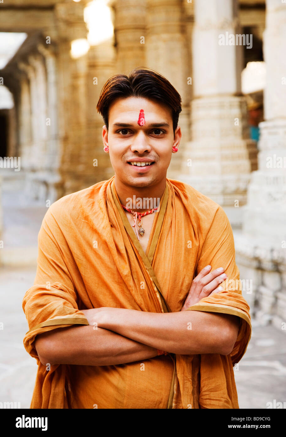 Portrait of a man smiling in a temple, Adinath Temple, Jain Temple ...