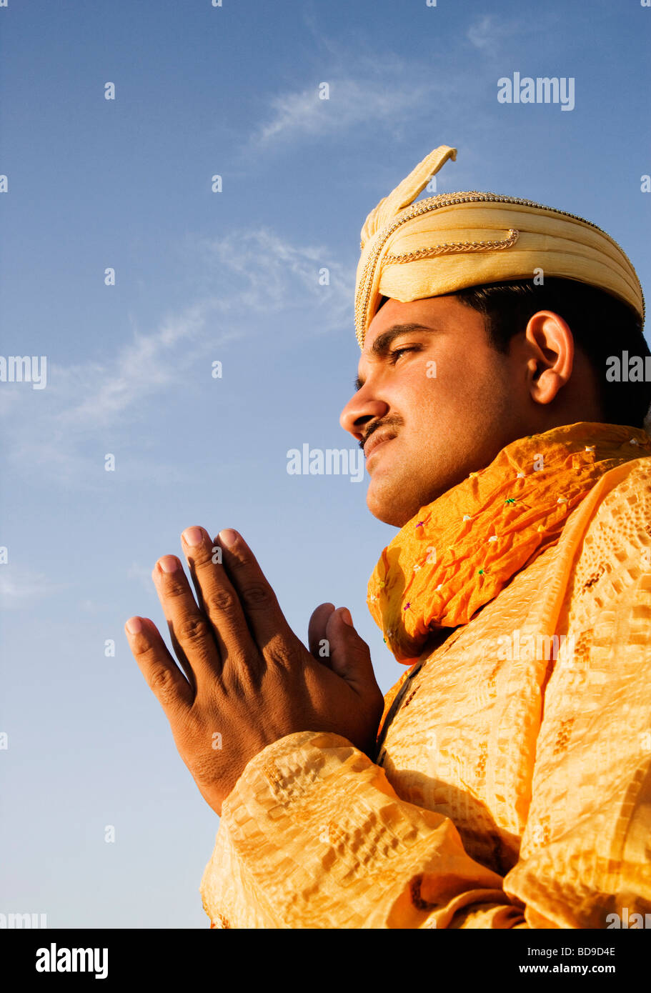 Side profile of a groom in prayer position, Jodhpur, Rajasthan, India ...