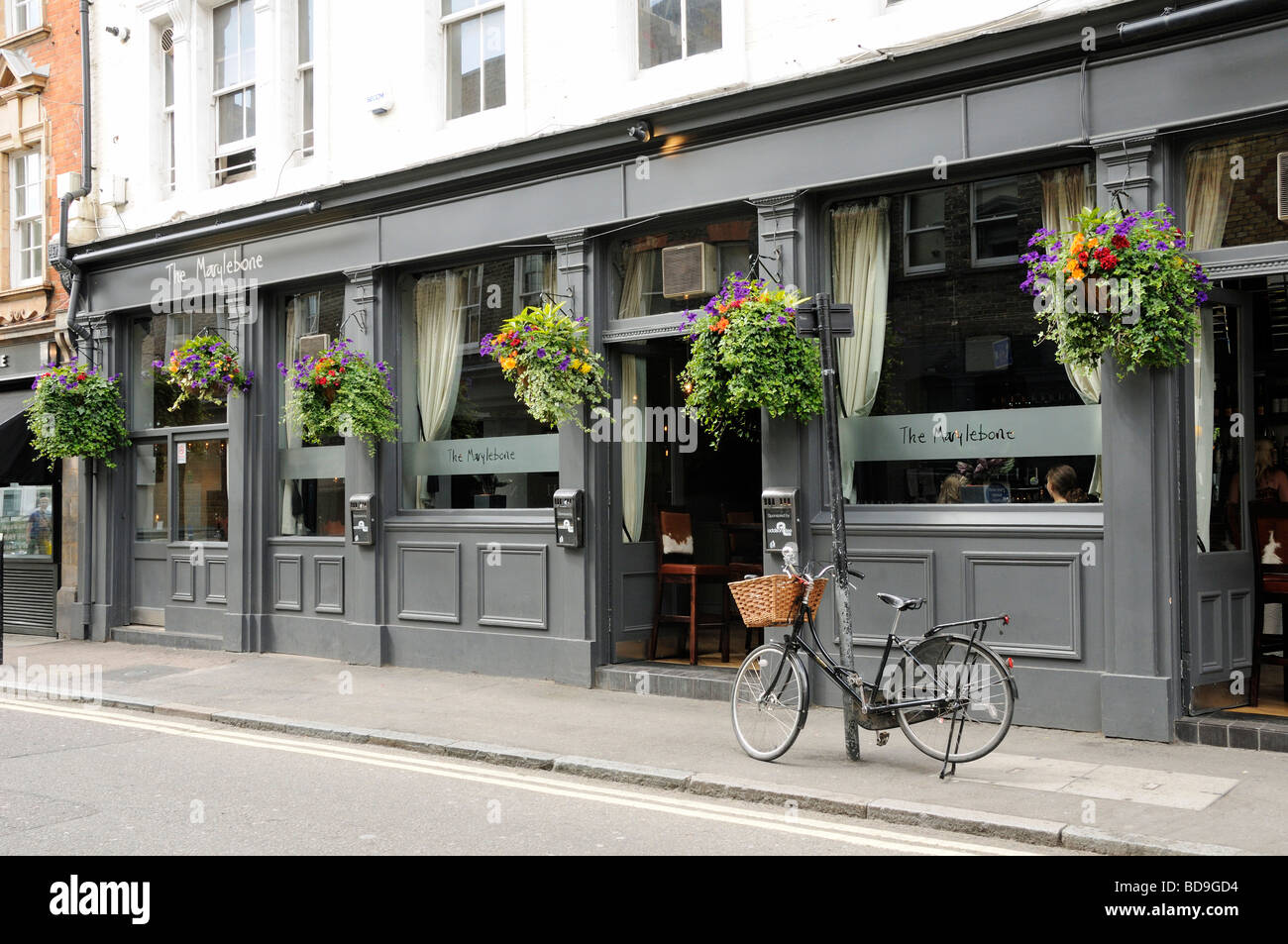 The Marylebone bar with bike chained outside London England UK Stock ...