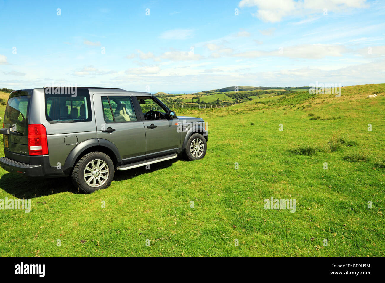 A Land Rover Discovery 3 in an upland location, with distant views on ...