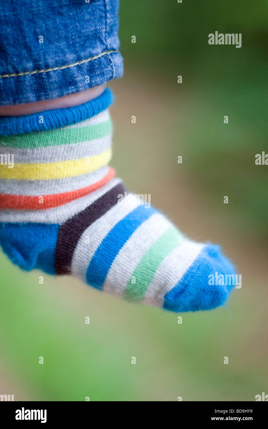 Sock on a baby foot Stock Photo - Alamy