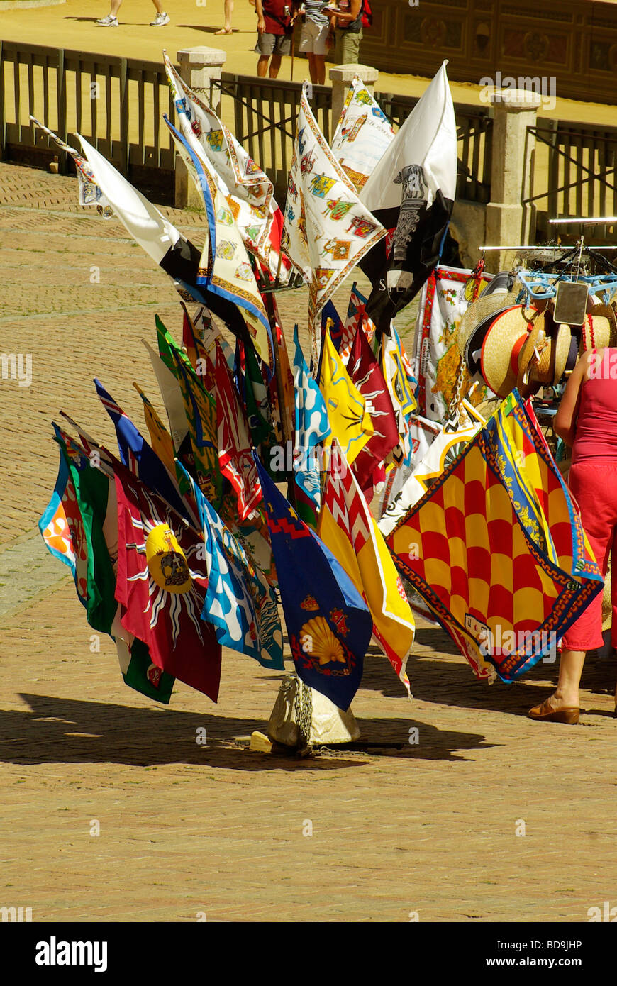 Tourist stall selling flags of the contrada in the Piazza Il Campo ...