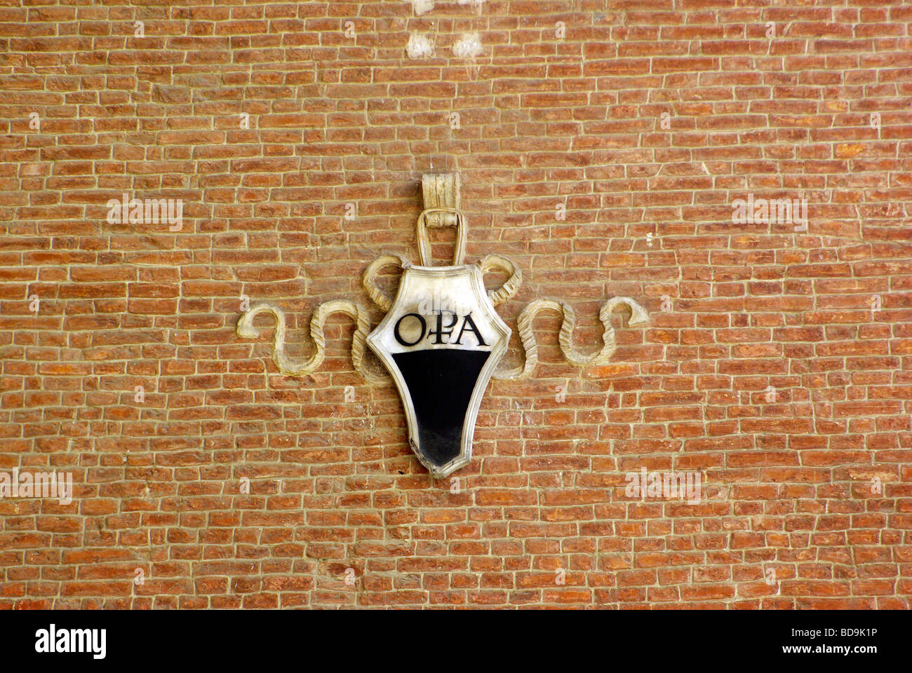 Sheild or stemma for the Museo della Opera, Siena showing the black and ...