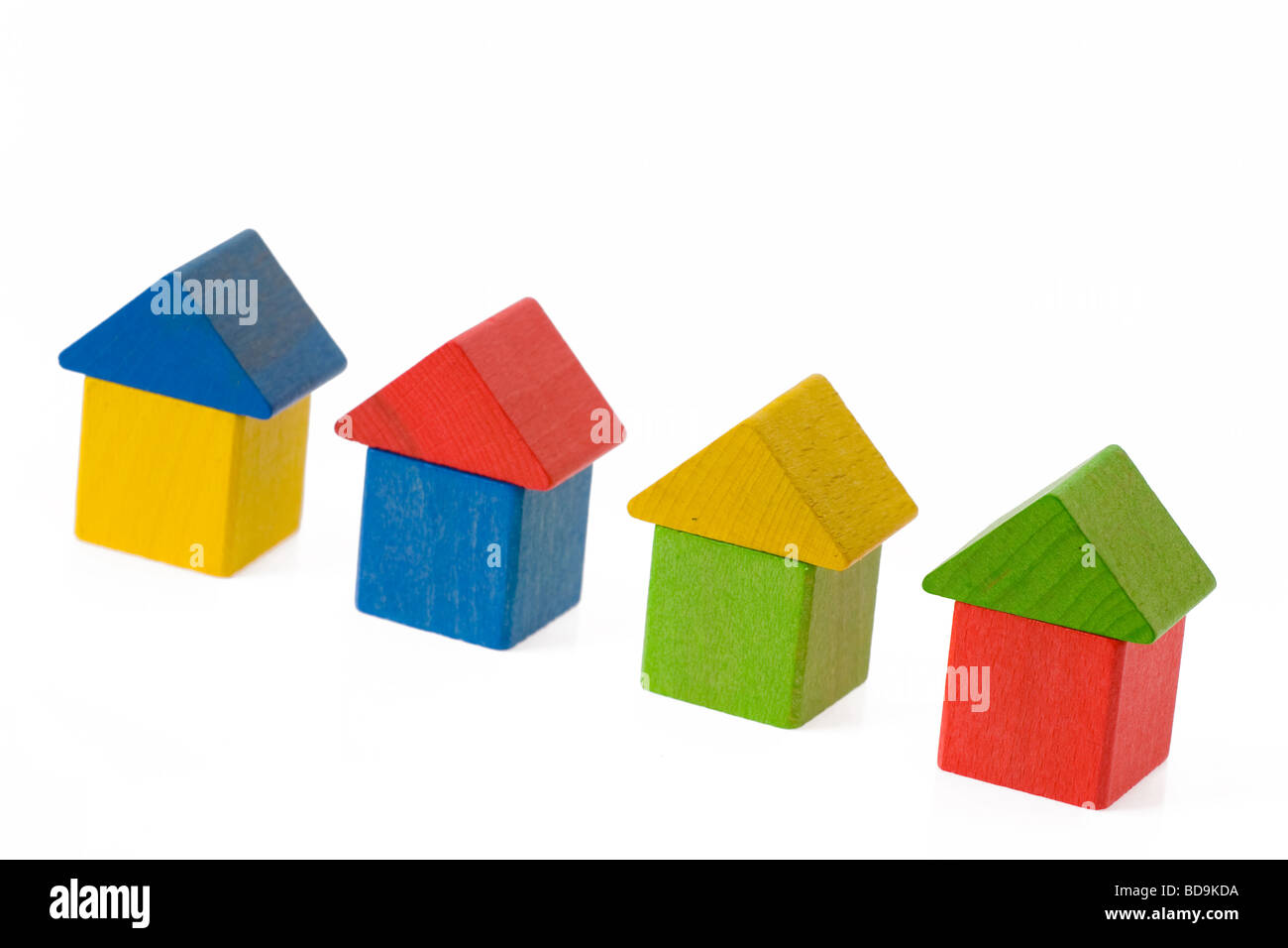 Wooden toy blocks on white background Stock Photo - Alamy