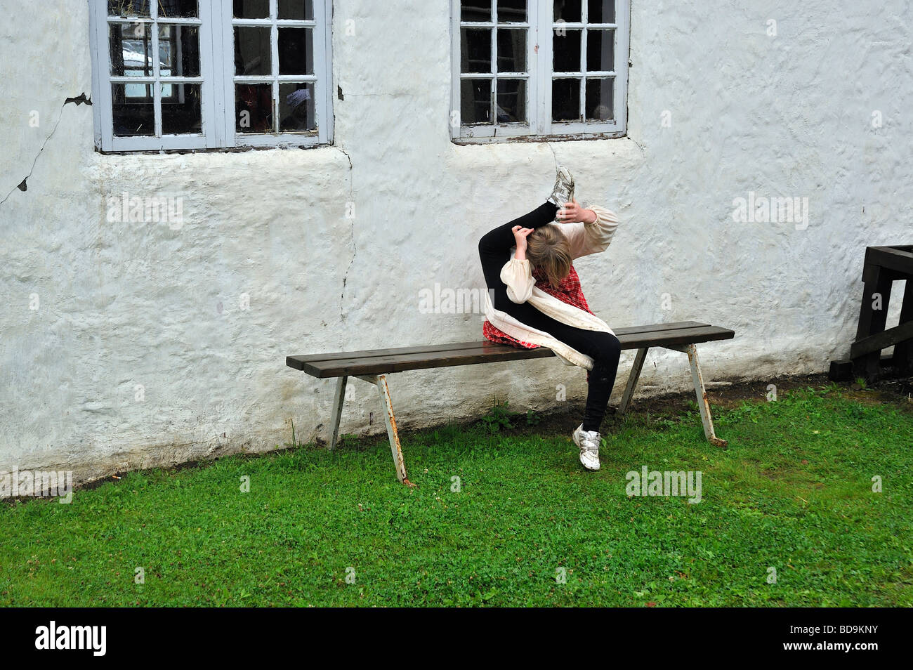 Girl bending over hi-res stock photography and images - Alamy