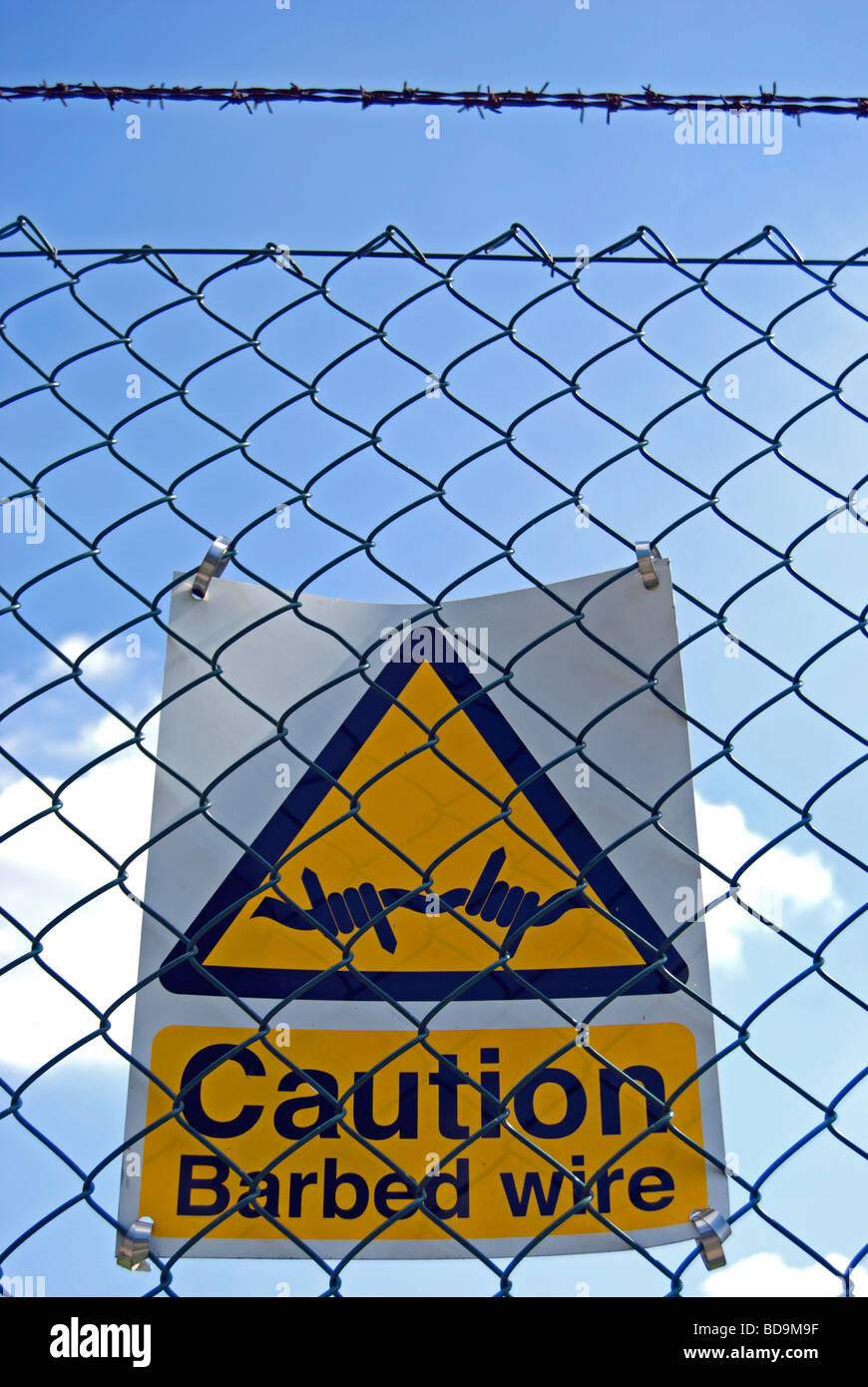 Caution sign on fence hi-res stock photography and images - Alamy