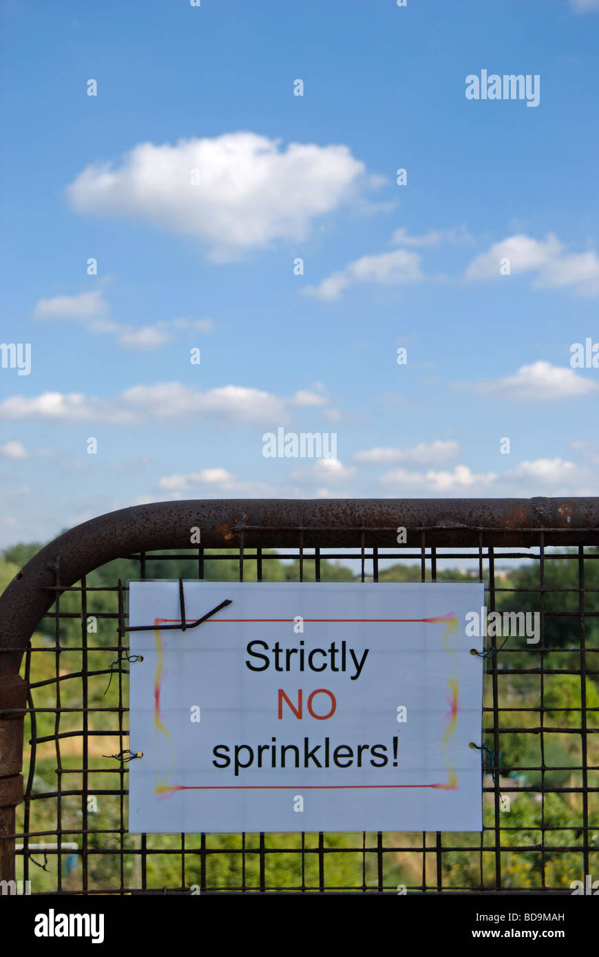 strictly no sprinklers sign above allotments in chiswick, west london ...