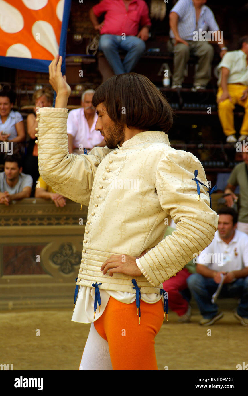 Flag thrower of the Unicorn Contrada - Siena Palio, a twice yearly ...