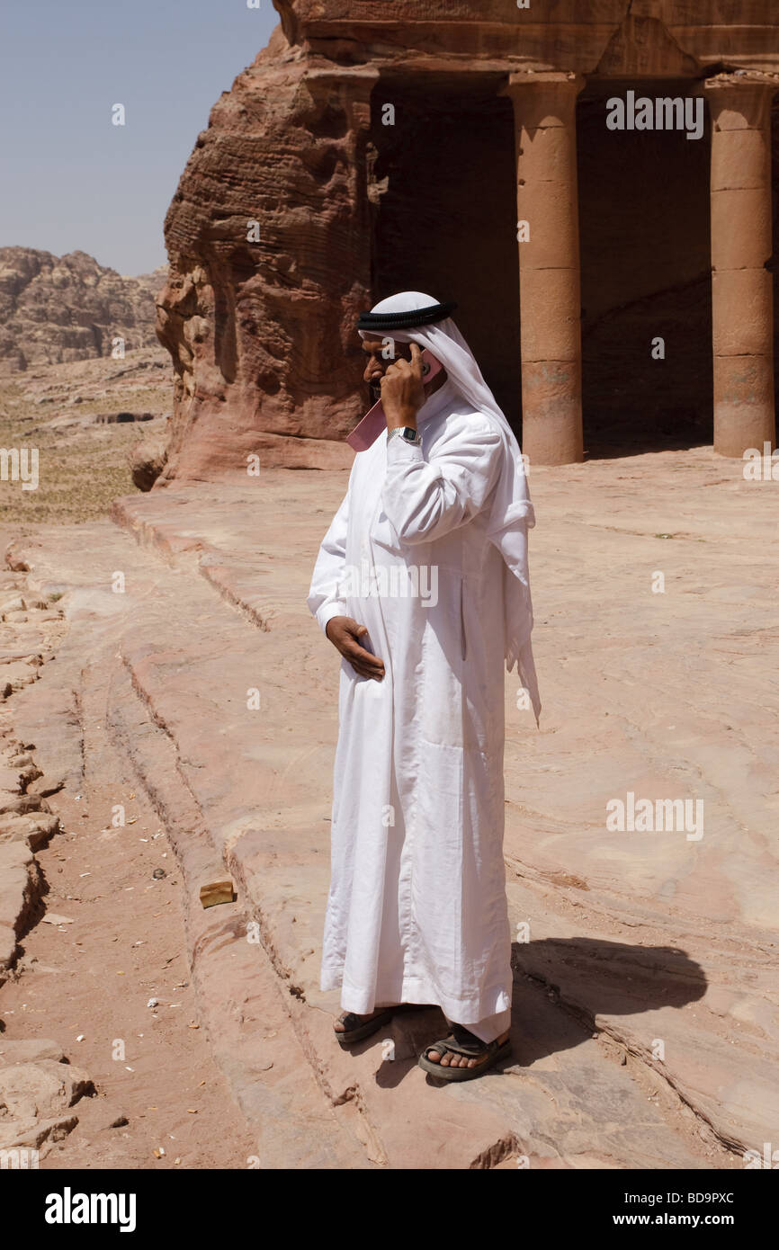 Jordanian man using a mobile phone, Petra, Jordan Stock Photo - Alamy