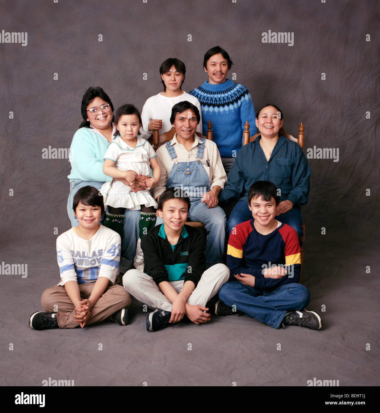 Color studio portrait of Inuit family in a photography studio in ...