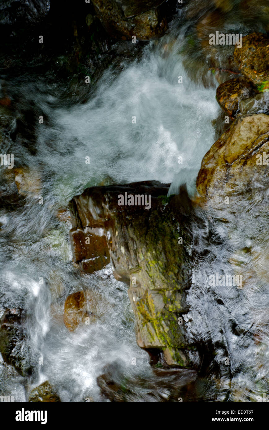 Water stream splashing on stones hi-res stock photography and images ...