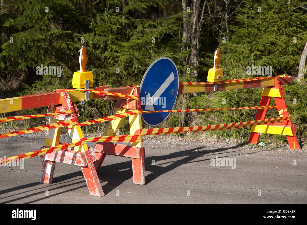 Road closed, redirecting traffic with Finnish traffic sign ( Pass this ...