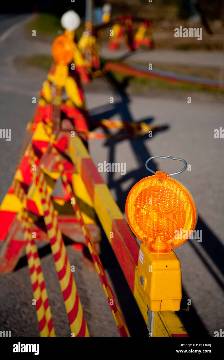 Warning light at roadworks site Stock Photo - Alamy