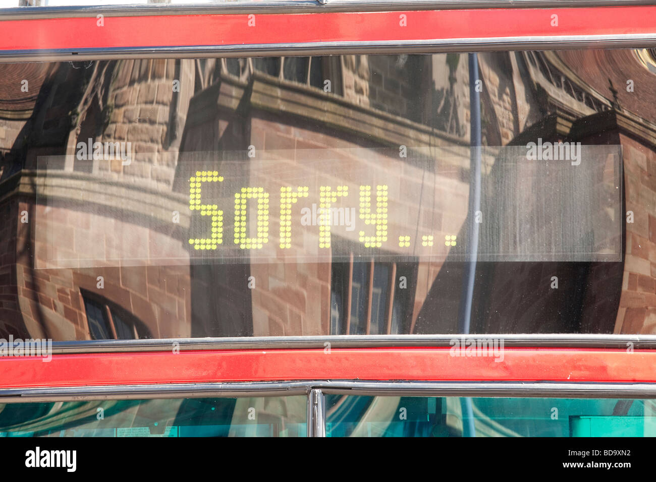 yellow display on front of public bus saying sorry Stock Photo - Alamy