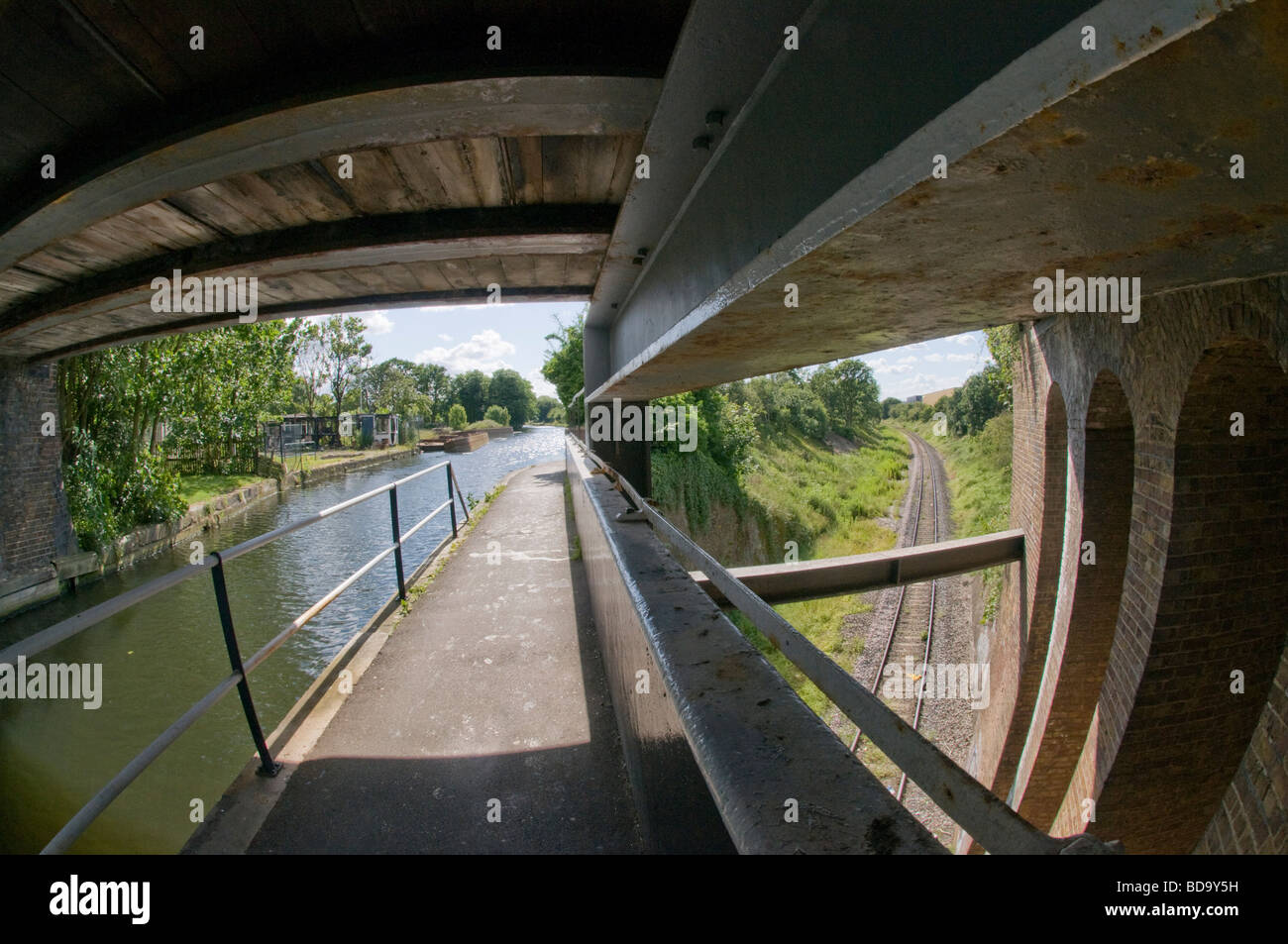 Unique three level bridge with railway, canal and road in West London ...