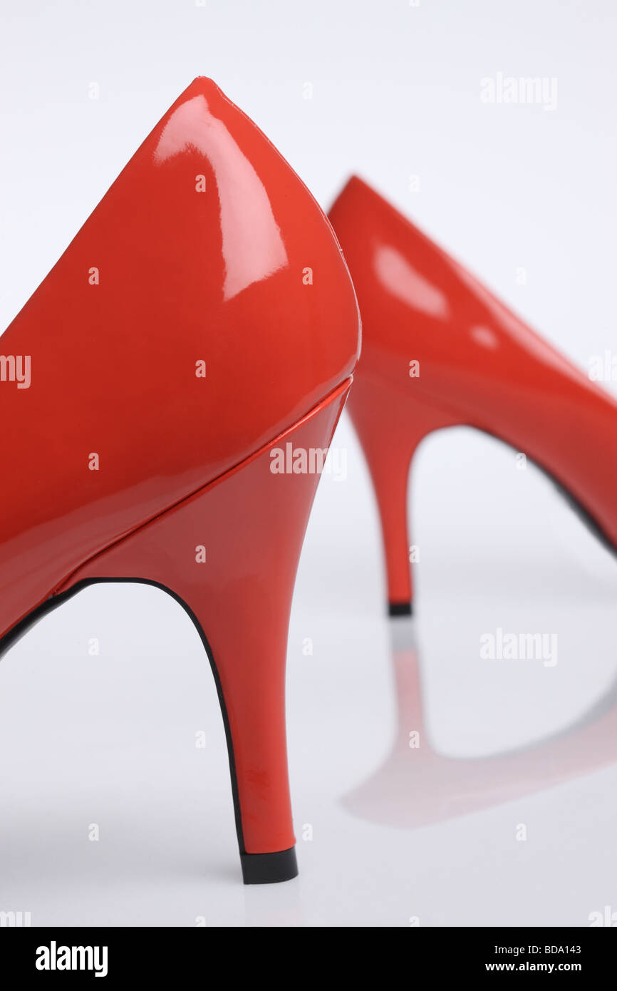 Red high heel shoes on white background Stock Photo - Alamy