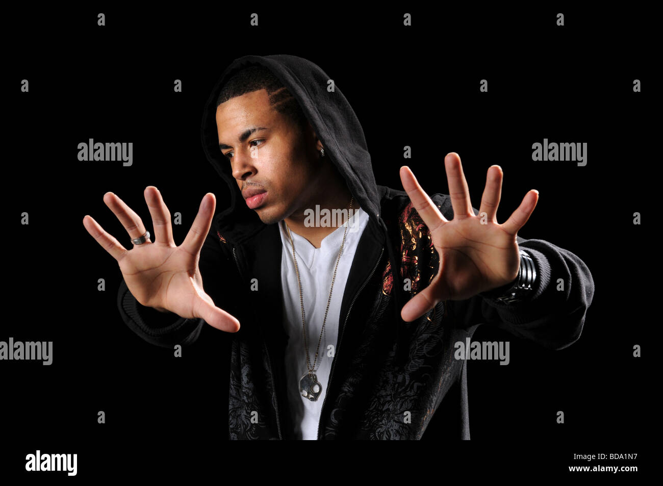 African American hip hop dancer with hands in foreground Stock Photo ...