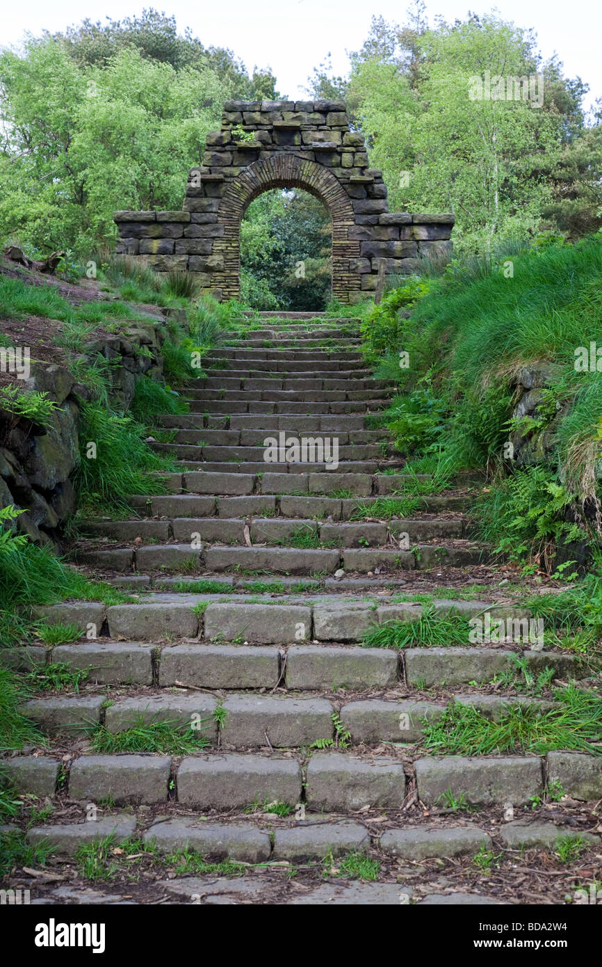 Steps leading to arch in in Rivington terraced gardens Lancashire UK ...