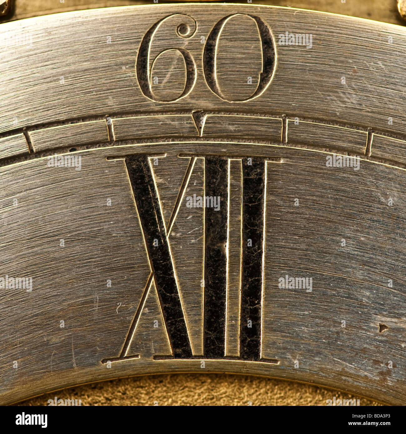 old antique clock face showing 60 and XII Stock Photo - Alamy